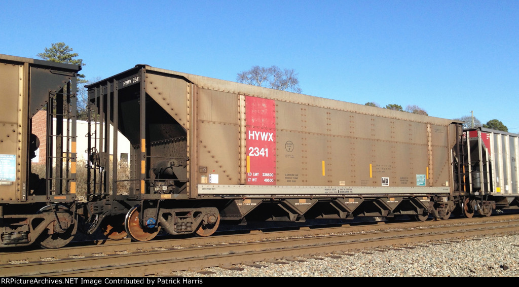 HYWX 2341 loaded Johnstown America 4400cf 5-bay hopper eastbound on the NS in a BNSF train at ...